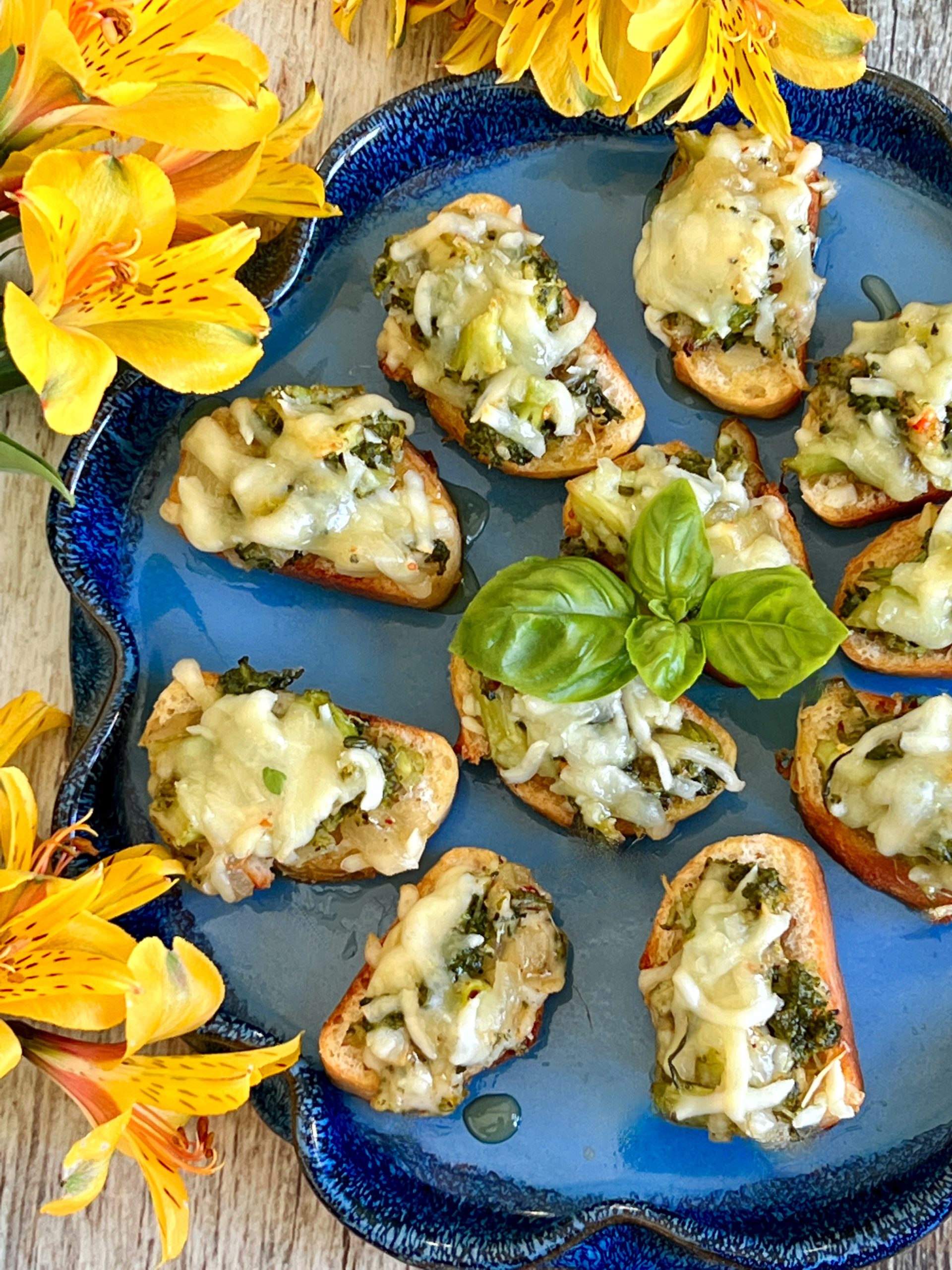 SWEET, SPICY, AND SUPER CHEESY BROCCOLI CROSTINI - Dish off the Block