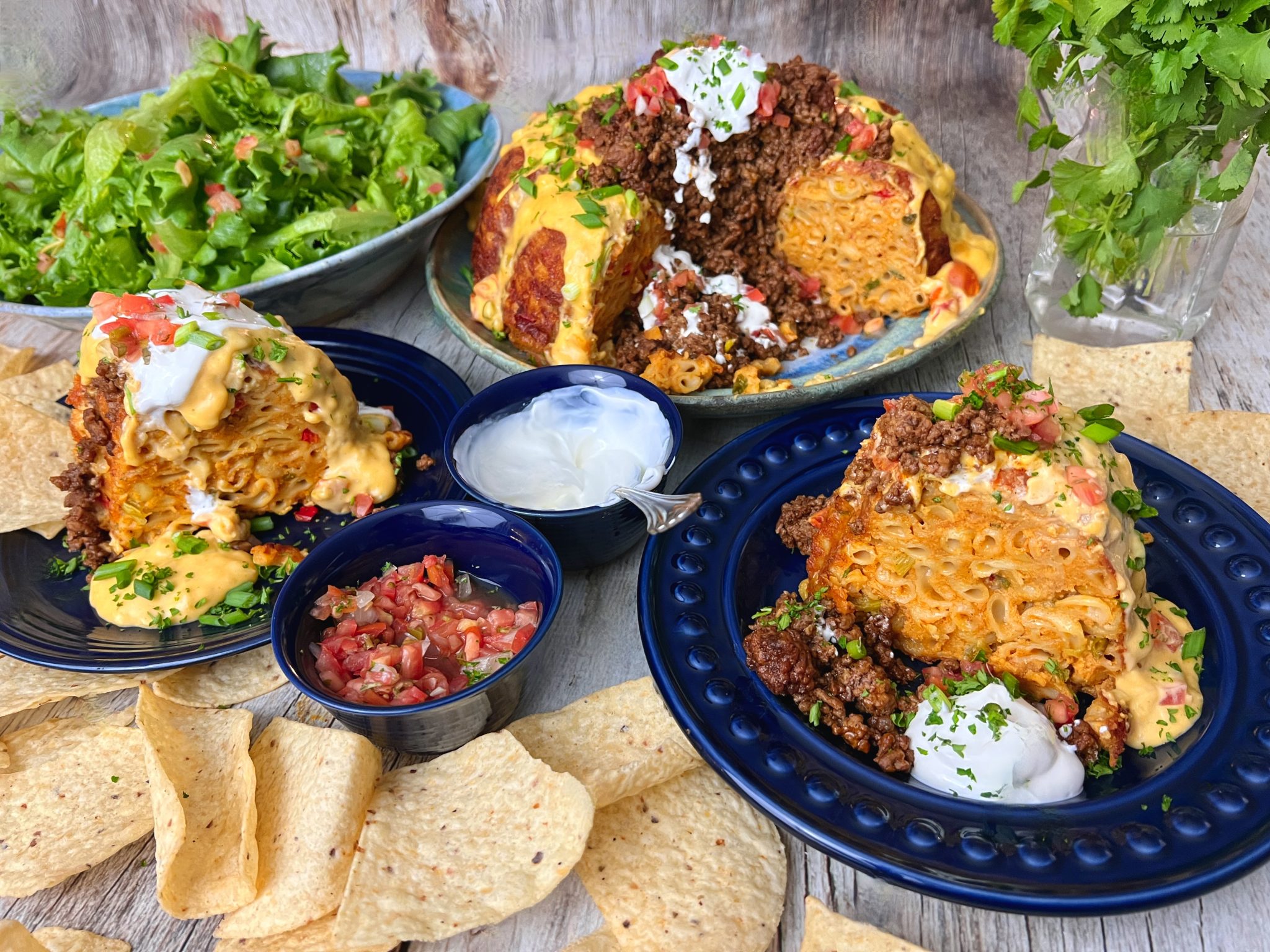TACO TUESDAY MAC & CHEESE RING WITH QUESO GLAZE AND CASCADING TACO MEAT ...