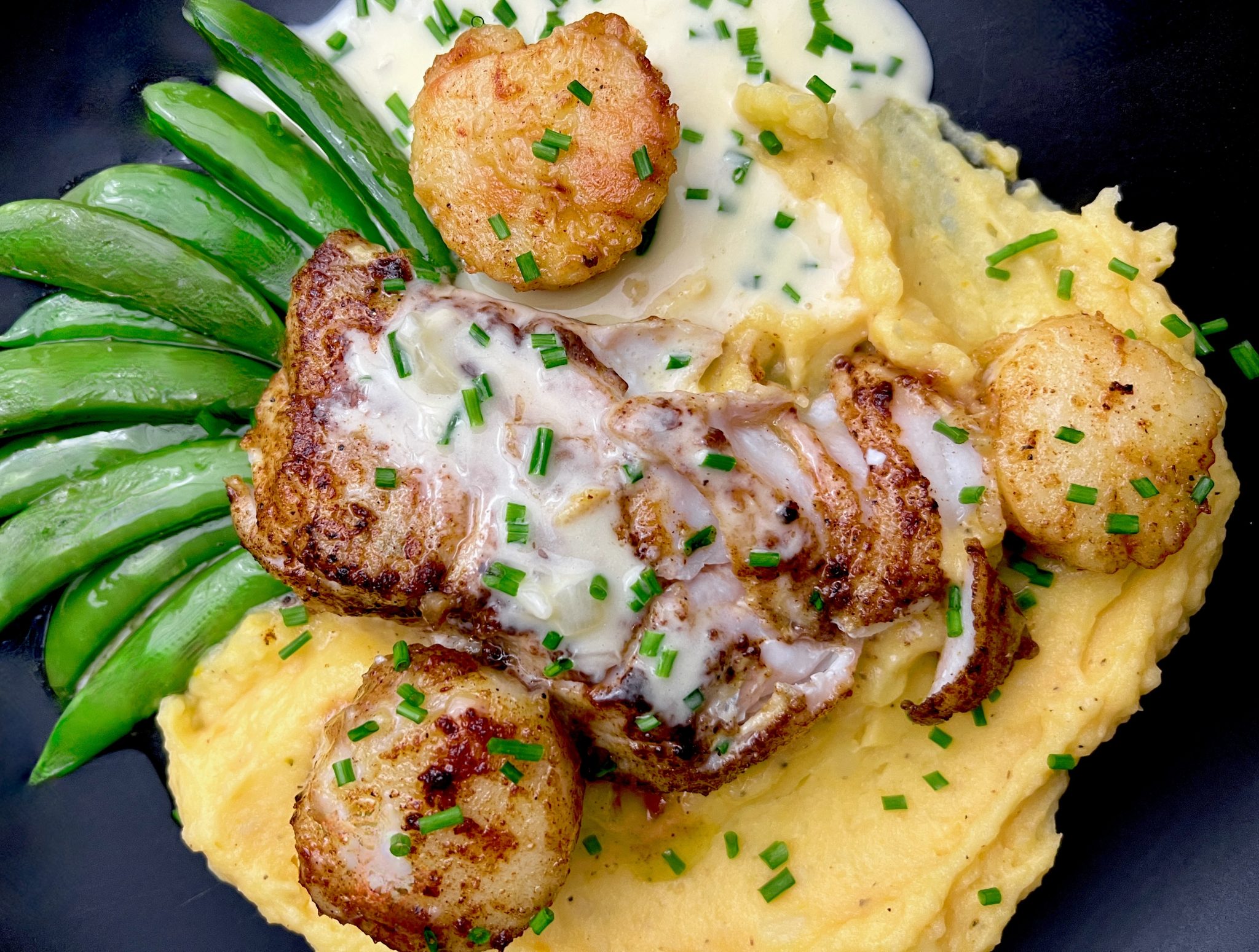 SUPERBLY HERBY HADDOCK AND SCALLOPS WITH DECADENT BEURRE BLANC SAUCE ...